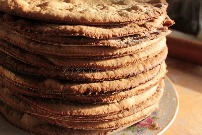 Stack of Home-cooked Cakes on the Kitchen Table. Process of Cake ...