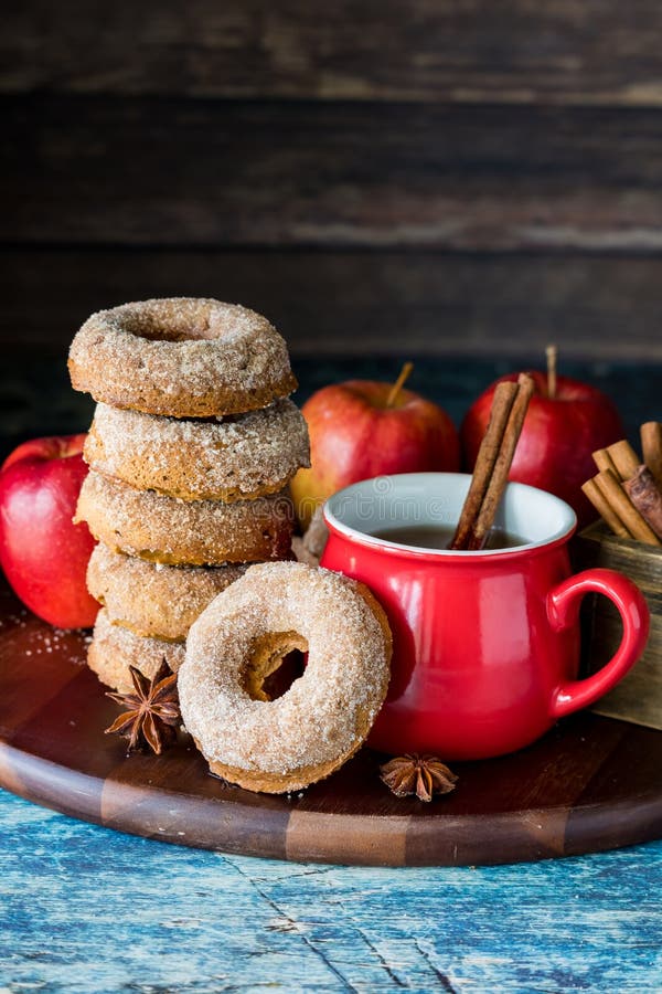 A Stack of Homemade Doughnuts Served with Spiced Hot Apple Cider. Stock ...