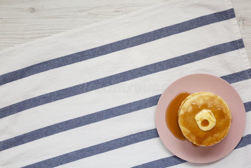 Stack of Homemade Pancakes with Butter and Maple Syrup on a Pink Plate ...