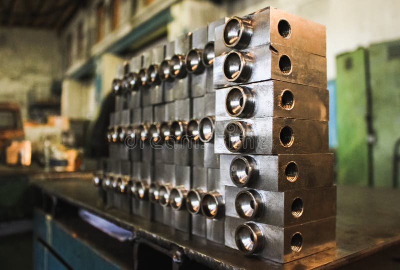 A Stack of Hydraulic Valves in the Production Shop. Selective Focus ...