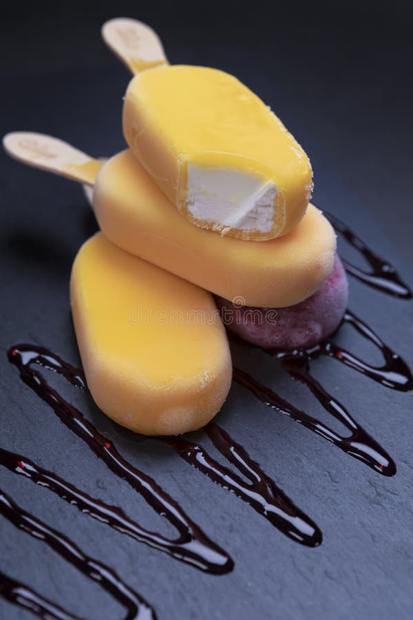 Stack of Ice Cream Stick Placed on a Black Stone Background Stock Photo ...