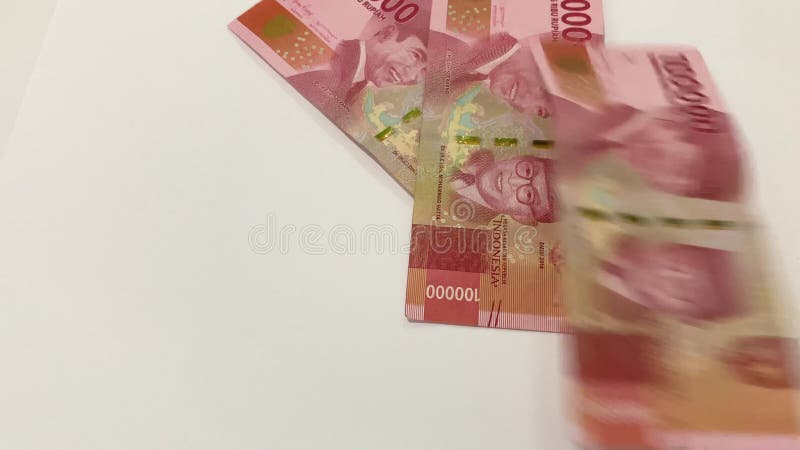 Stack of 100000 Indonesian Rupiah Notes Isolated on White Background ...