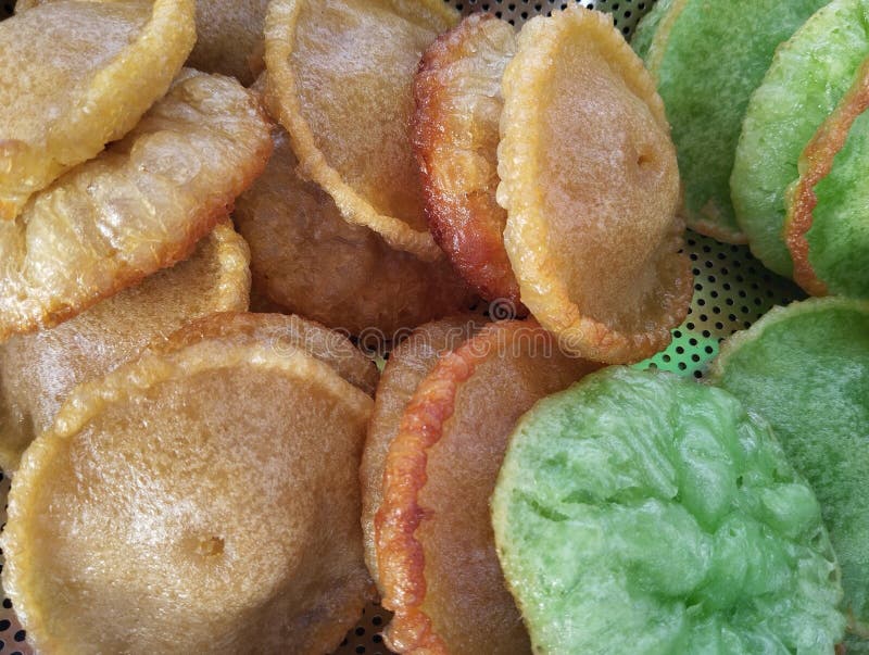 A Stack of Indonesian Traditional Snack Called Kue Cucur. they are ...