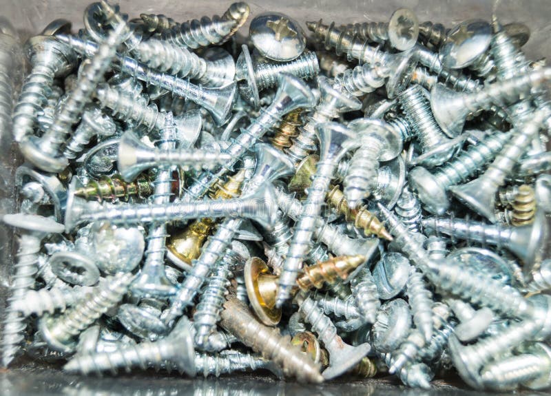Iron nuts nails and screws stock image. Image of industrial - 131663863
