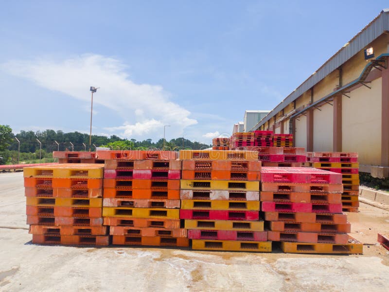 Stack of Industrial Plastic Pallets Stock Photo - Image of blue, empty ...
