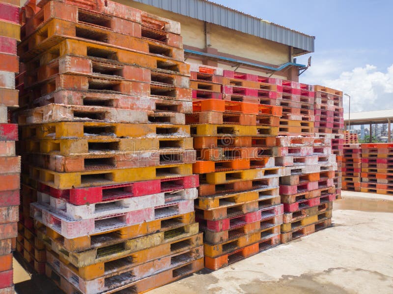 Stack of Industrial Plastic Pallets Stock Photo - Image of beach ...
