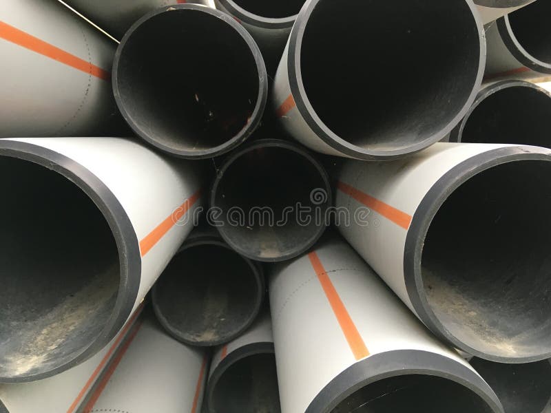 Stack of Industrial Pvc Pipes Stock Photo - Image of environment, road ...