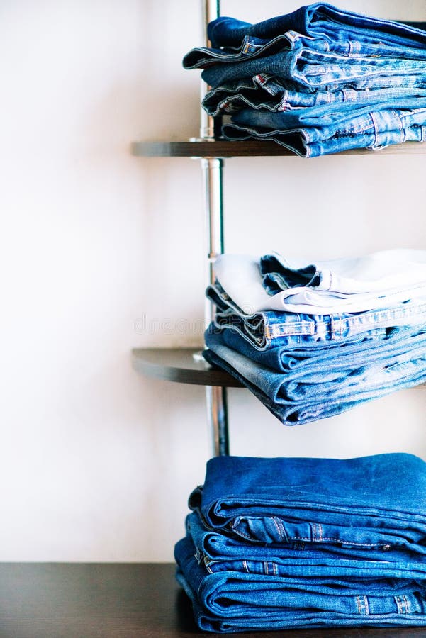 Stack of jeans stock image. Image of attire, fashion - 105869425
