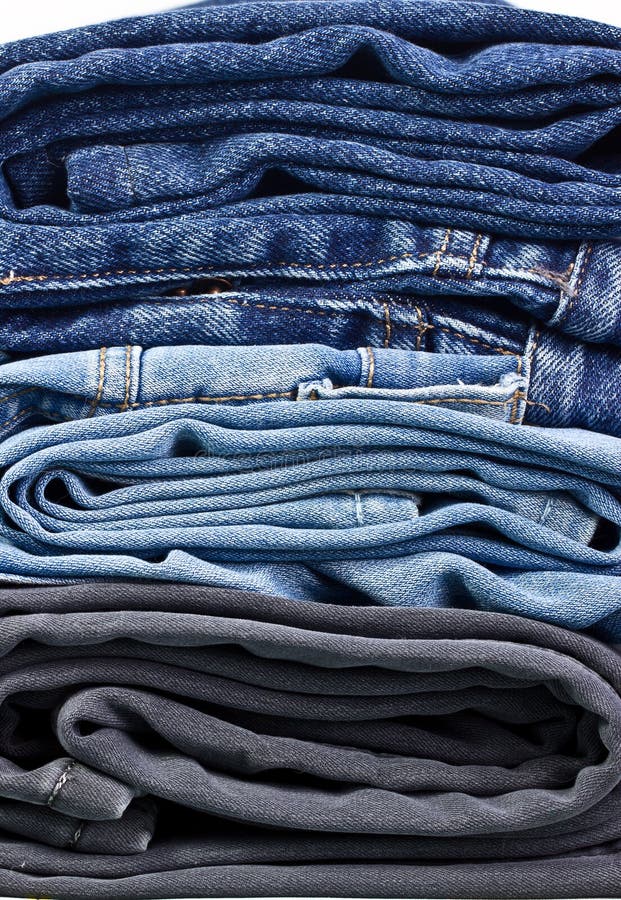 Stack of jeans closeup stock photo. Image of pants, design - 47595936