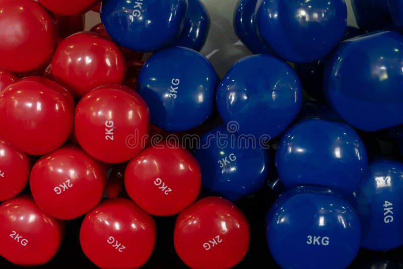 Stack of 3 and 4-kilogram Fitness Weights, Symbolizing Strength and ...