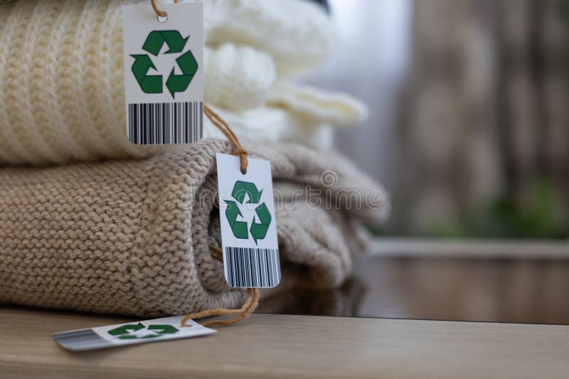 A Stack of Knitted Clothes Made from Natural Wool. Biodegradable, Eco ...