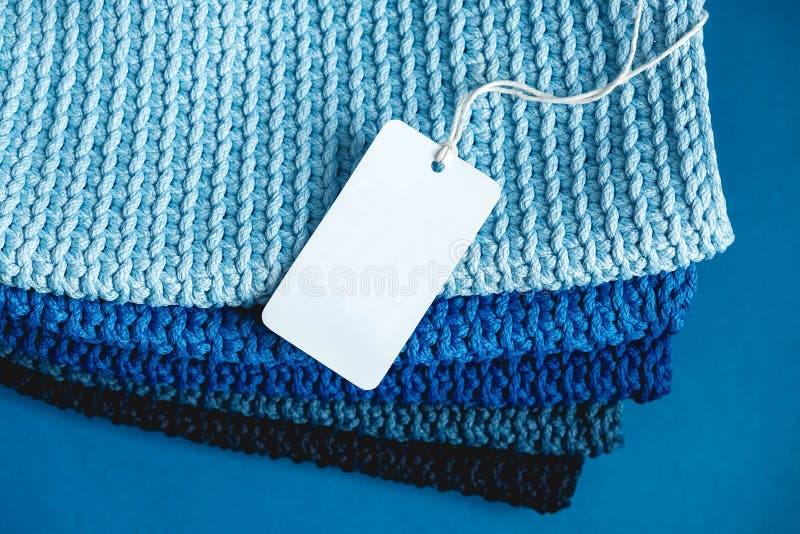 Stack of Knitted Material from Threads of Dark Blue, Light Blue, Gray ...