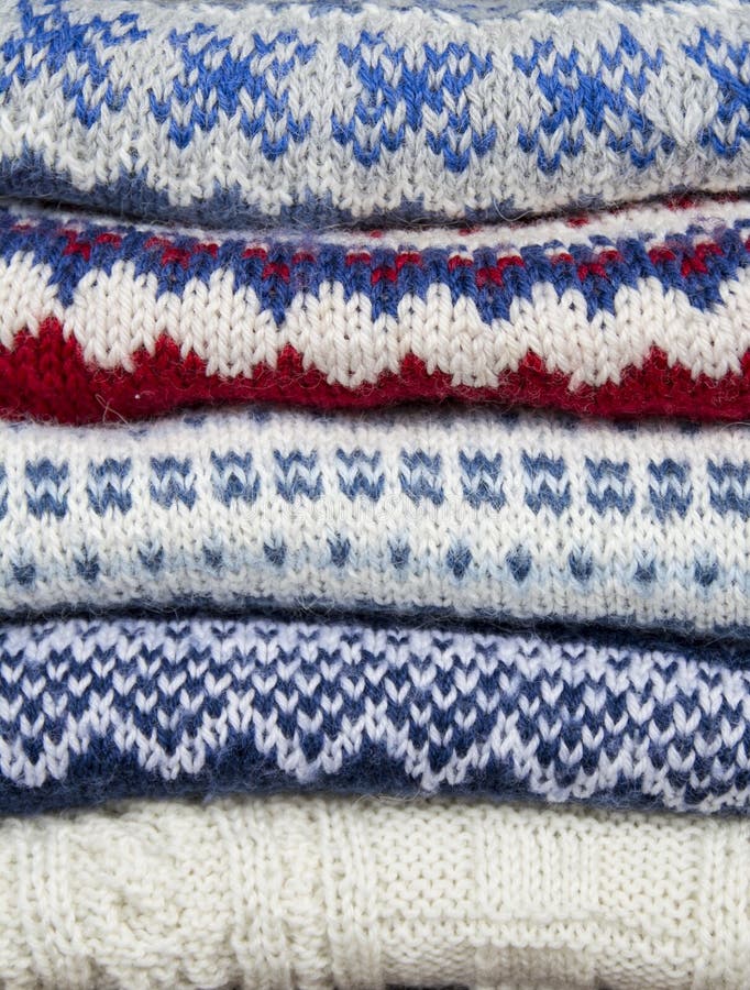 Stack of knitted sweaters stock image. Image of softness - 54302919