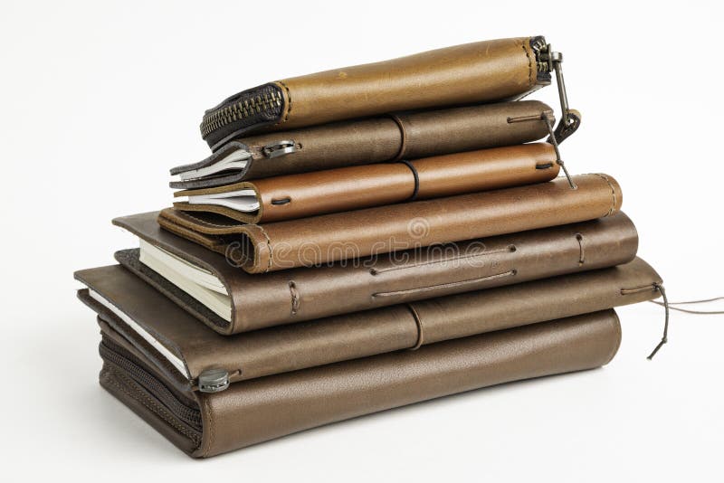 A Stack of Leather-Bound Journals, Notebooks, Wallets & Cases Stock ...