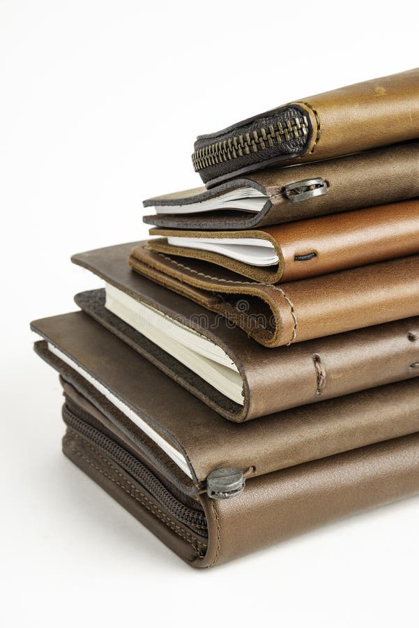 A Stack of Leather-Bound Journals, Notebooks, Wallets & Cases Stock ...