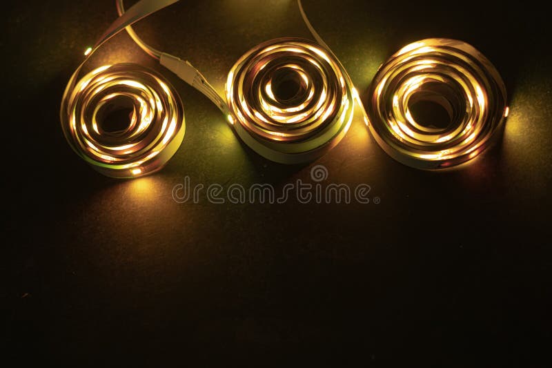 A Stack of LED Lights on Coiled Flexible Lighting Strips, Colored ...