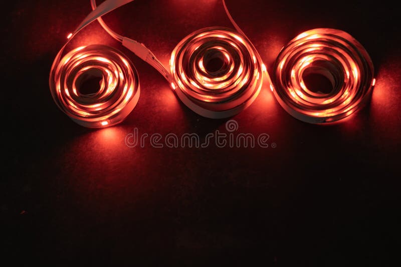 A Stack of LED Lights on Coiled Flexible Lighting Strips, Red Colors ...
