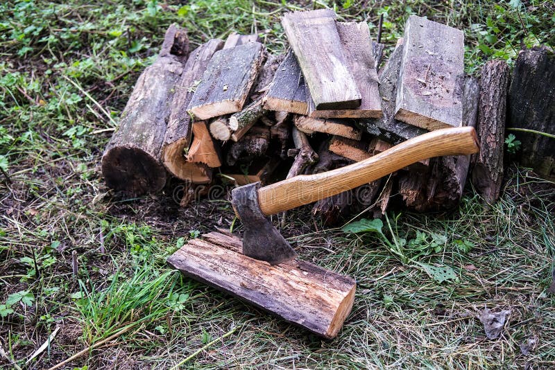 Stack of logs with axe stock image. Image of rusty, pile - 96009939