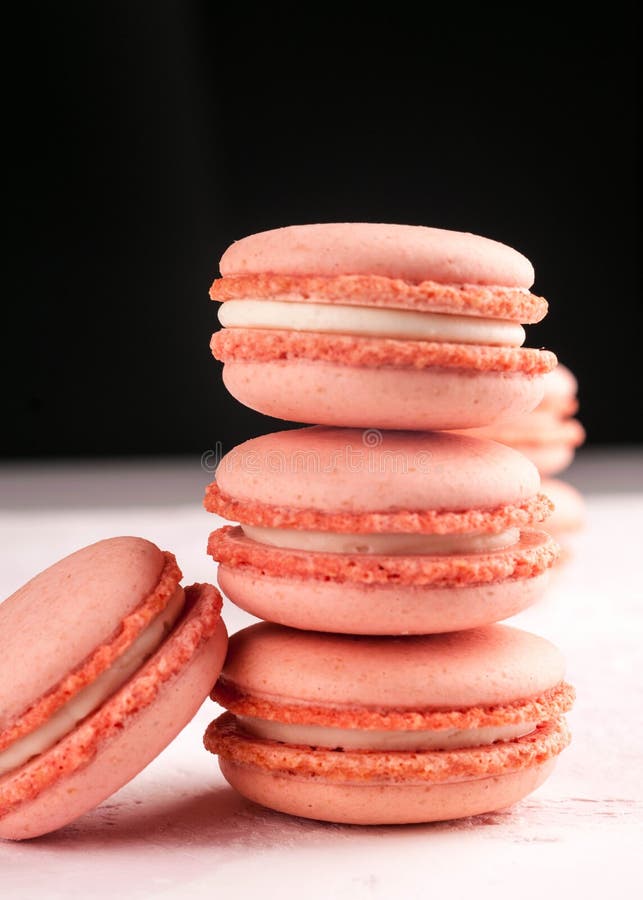 Stack with Macaron on White Texutured Background Isolated on Black ...