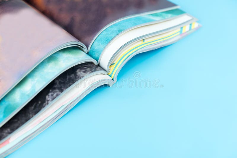 Stack Magazines on Blue Background Stock Image - Image of communication ...