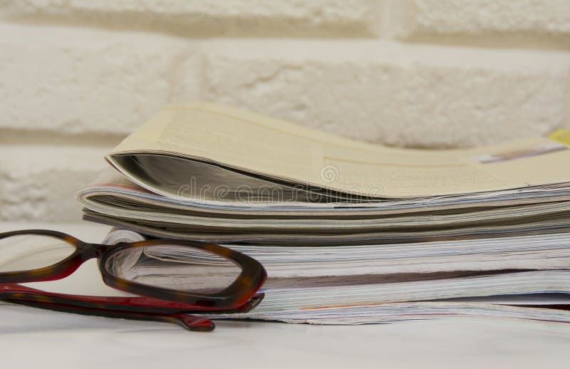 Stack of Magazines on Table Stock Image - Image of closeup, leisure ...