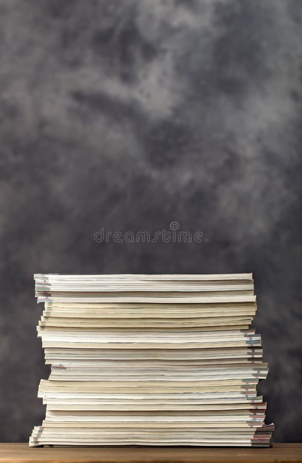 Stack of Magazines on Table Stock Photo - Image of paper, issue: 56415334