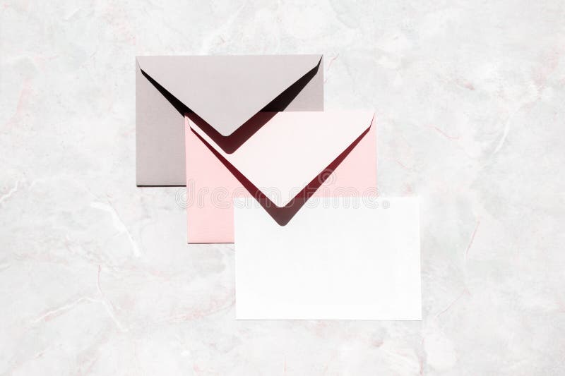 Stack of Mail Envelopes and Empty White Paper Card on Marble Stone ...