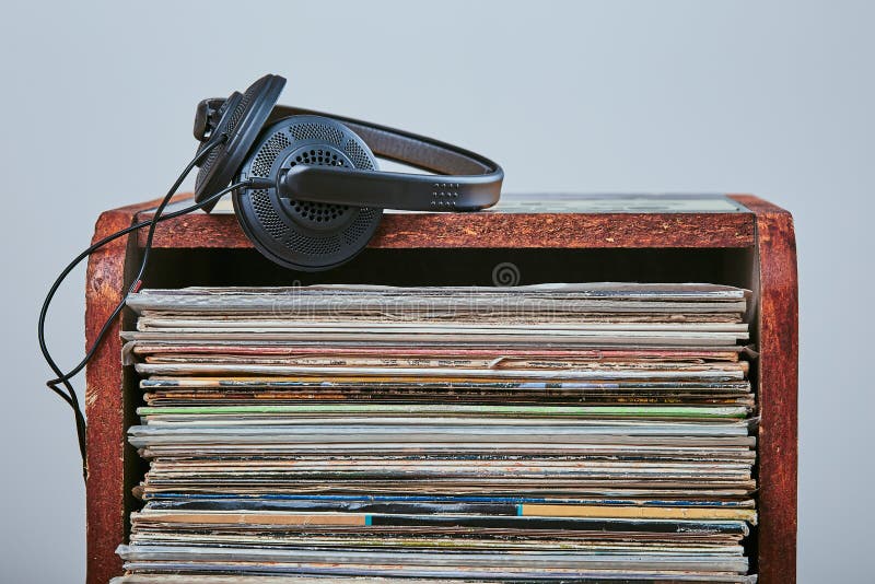 Vinyl Records and on Old Wooden Background. Records Collection. Music ...
