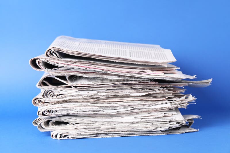 Stack of Many Newspapers on Blue Background Stock Image - Image of ...
