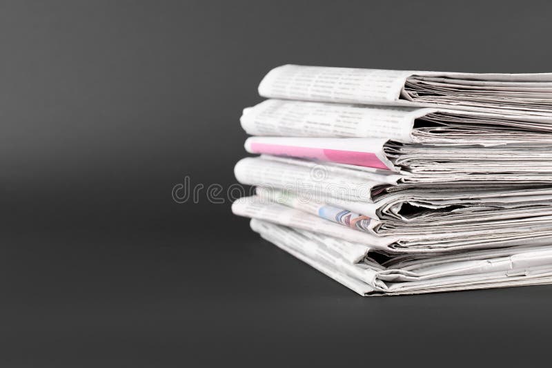 Stack of Many Newspapers on Grey Background, Space for Text Stock Photo ...