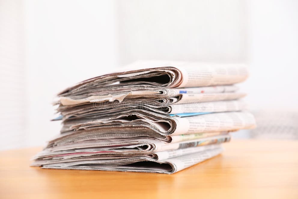 Stack of Many Newspapers on Wooden Table Stock Photo - Image of morning ...