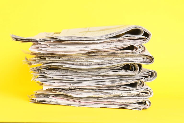 Stack of Many Newspapers on Yellow Background Stock Image - Image of ...