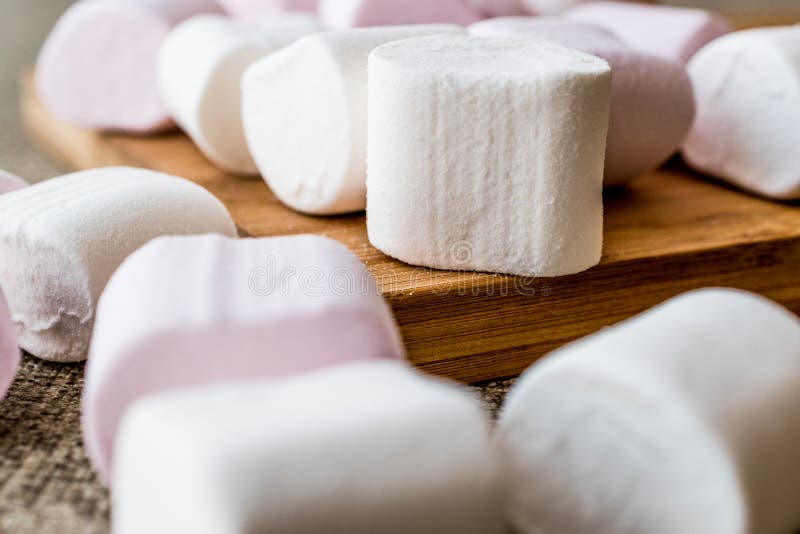 Stack of Marshmallows on Wooden Surface. Stock Image - Image of lots ...