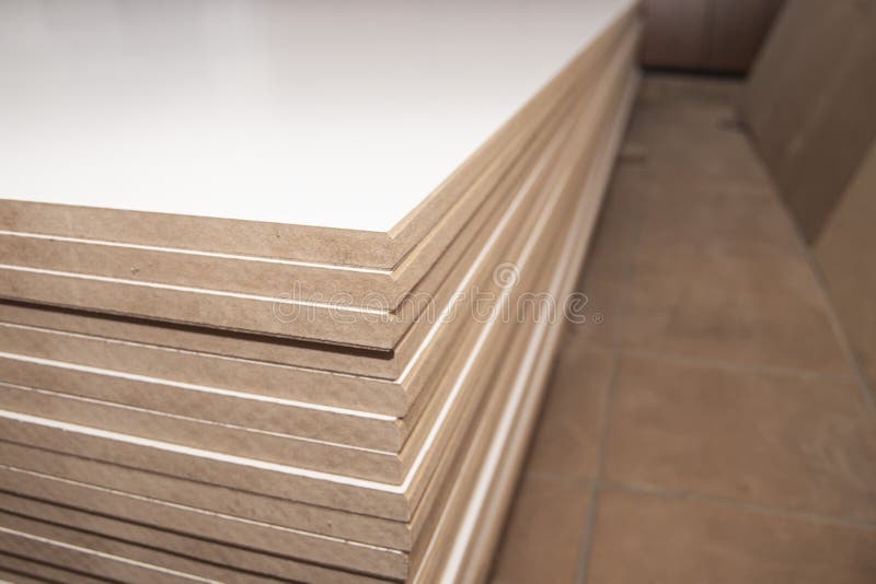 A Stack of Mdf Panels Neatly Stacked in a Cabinetry Shop, Background ...