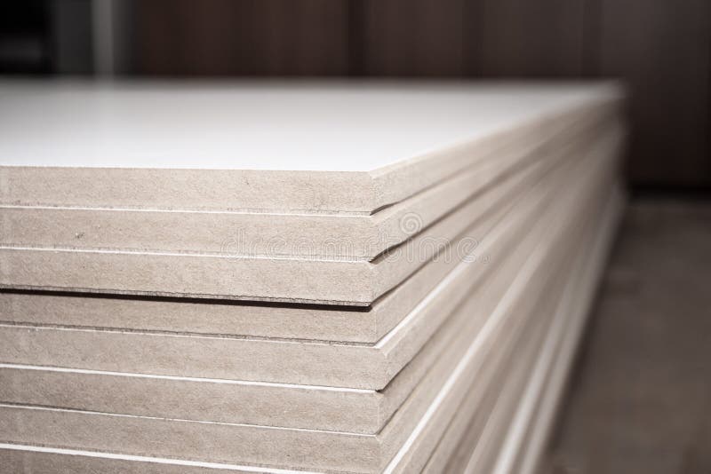 A Stack of Mdf Panels Neatly Stacked in a Cabinetry Shop, Background ...