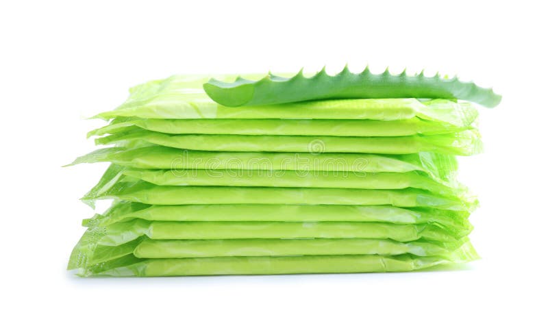 Stack of Menstrual Pads and Aloe Leaf on White Background. Stock Photo ...
