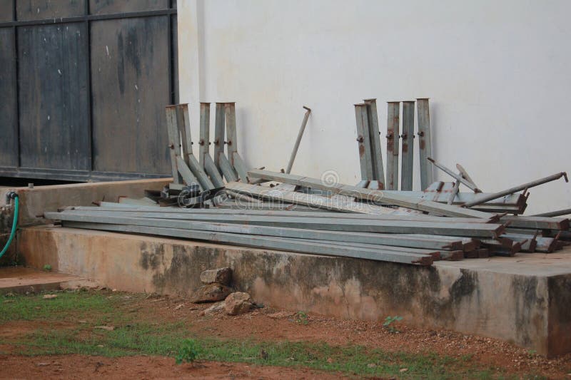 Stack of Metal Frames and Supports on Concrete Base Outdoors Stock ...