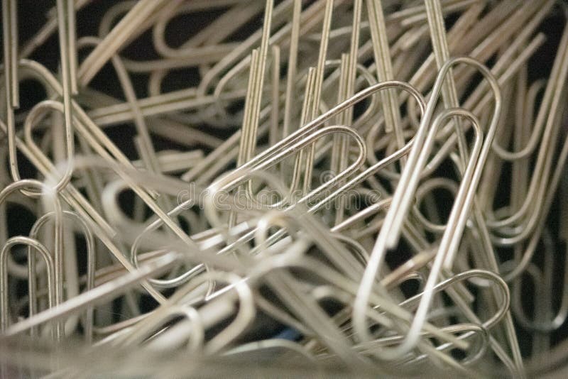 Stack of metal paper clips stock image. Image of concept - 208576085