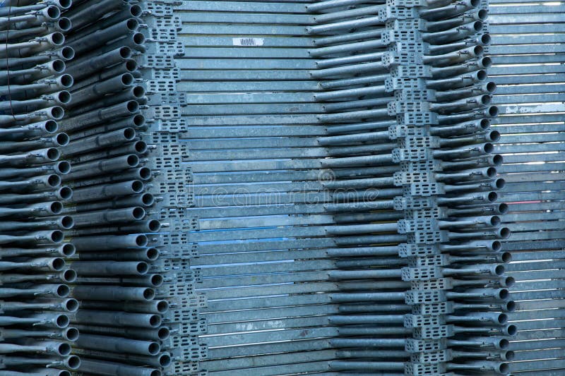 Stack of Metal Scaffolding Parts Organized in Vertical Rows for ...