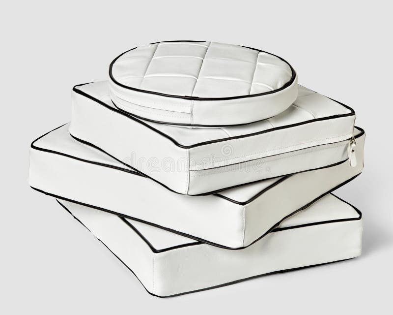 Stack of Minimalist Square and Round White Leather Seat Cushions Stock ...