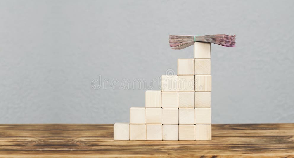 Stack of Money at the Top of the Pyramid. the Concept of Achieving ...