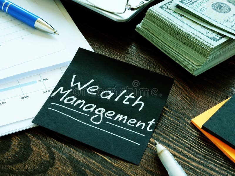 Stack of Money and Wealth Management Sign on the Sheet. Stock Photo ...