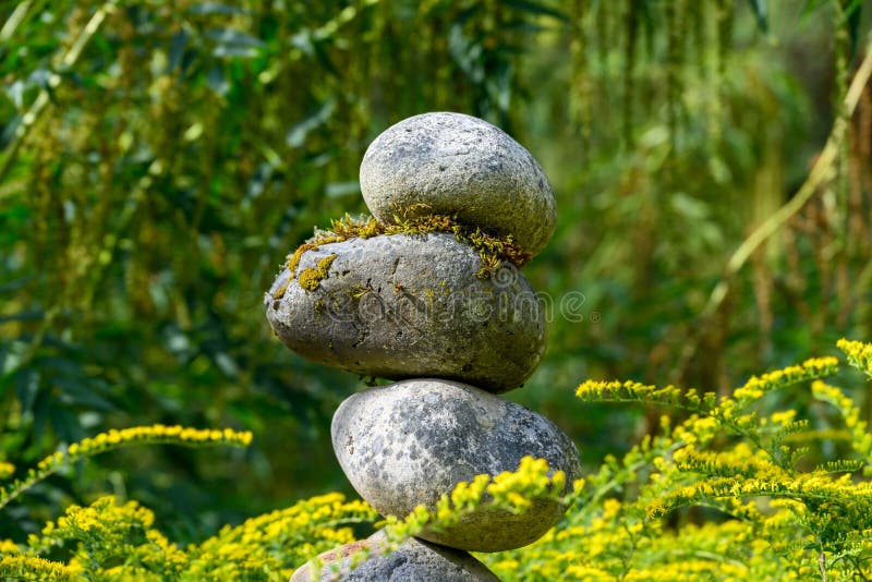 Stack of Moss and Lichen Covered River Rocks in a Summer Garden, As a ...