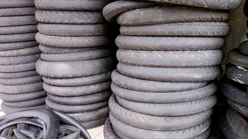 A Stack of Used Motorcycle Tyre Stock Photo - Image of objects, dirty ...