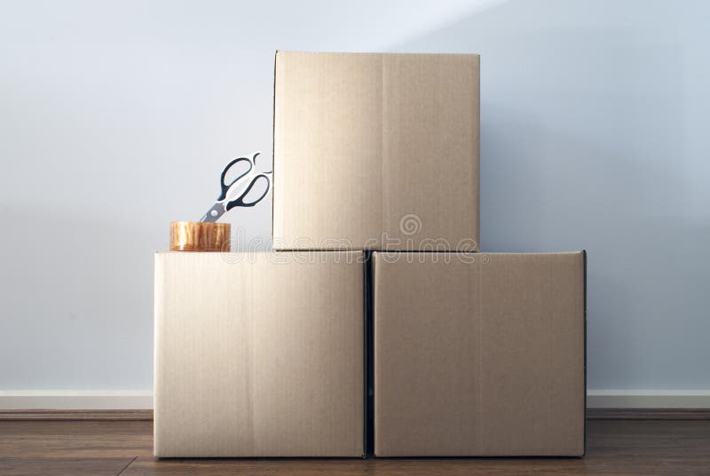 Stack of moving boxes stock image. Image of floor, scissors - 72648885