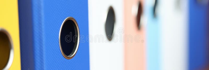 Stack of Multi-colored Folders is on the Table. Stock Image - Image of ...