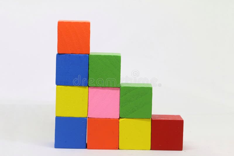 Stack of Multi Coloured Wooden Blocks Isolated on White Background ... Stack of Multi Coloured Wooden Blocks Isolated on White Background ...
