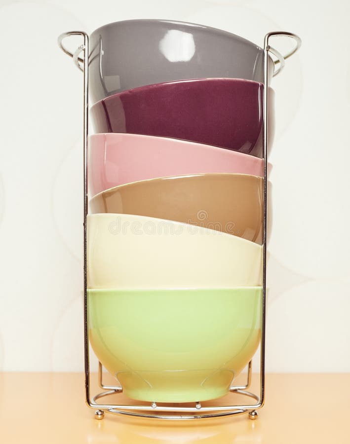 Stack of Multicolor Ceramic Bowls. Pile of Ceramic Dish on Table. Stack ...