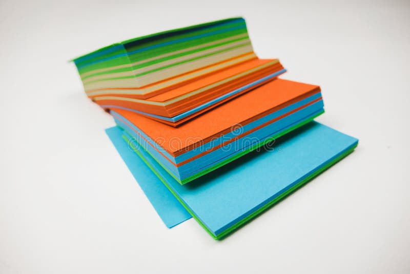 A Stack of Multicolored Note Papers on an Isolated White Background ...