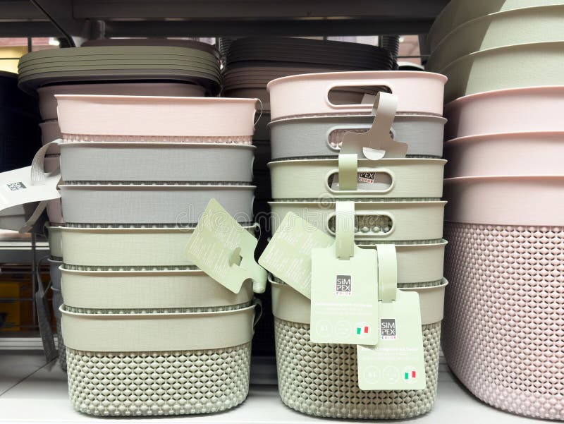 Stack of Neutral-toned Storage Baskets in Various Sizes on Store Shelf ...